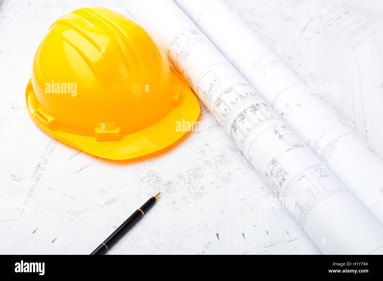 Construction drawing and safety helmet Stock Photo - Alamy