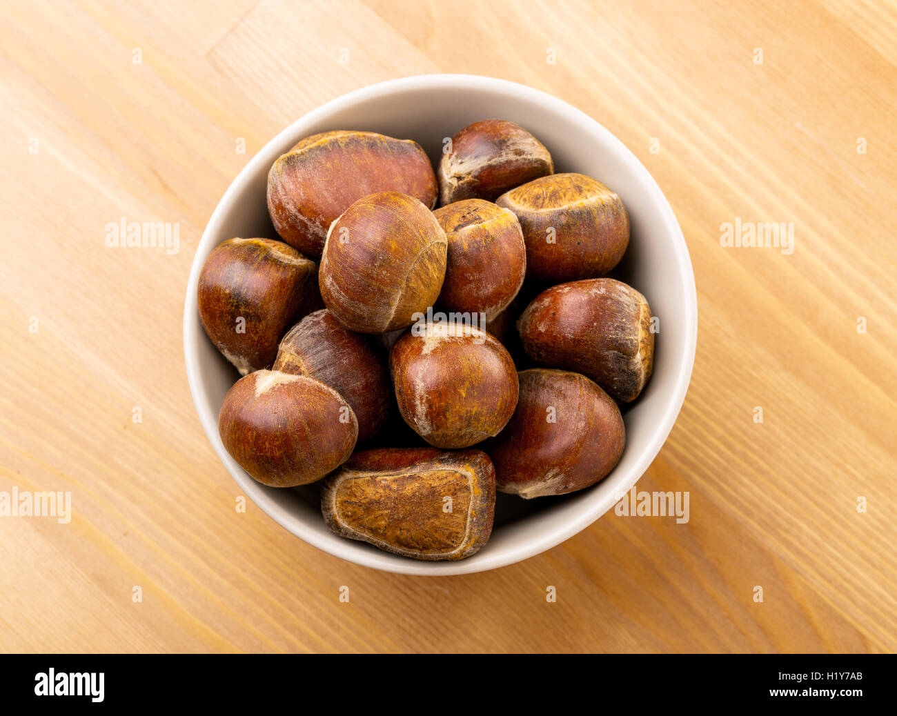 Chestnut in white bowl Stock Photo - Alamy