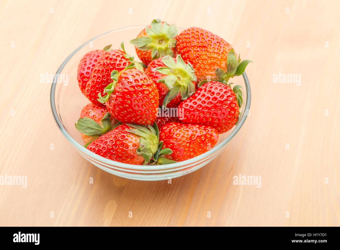 Strawberry in bowl Stock Photo - Alamy