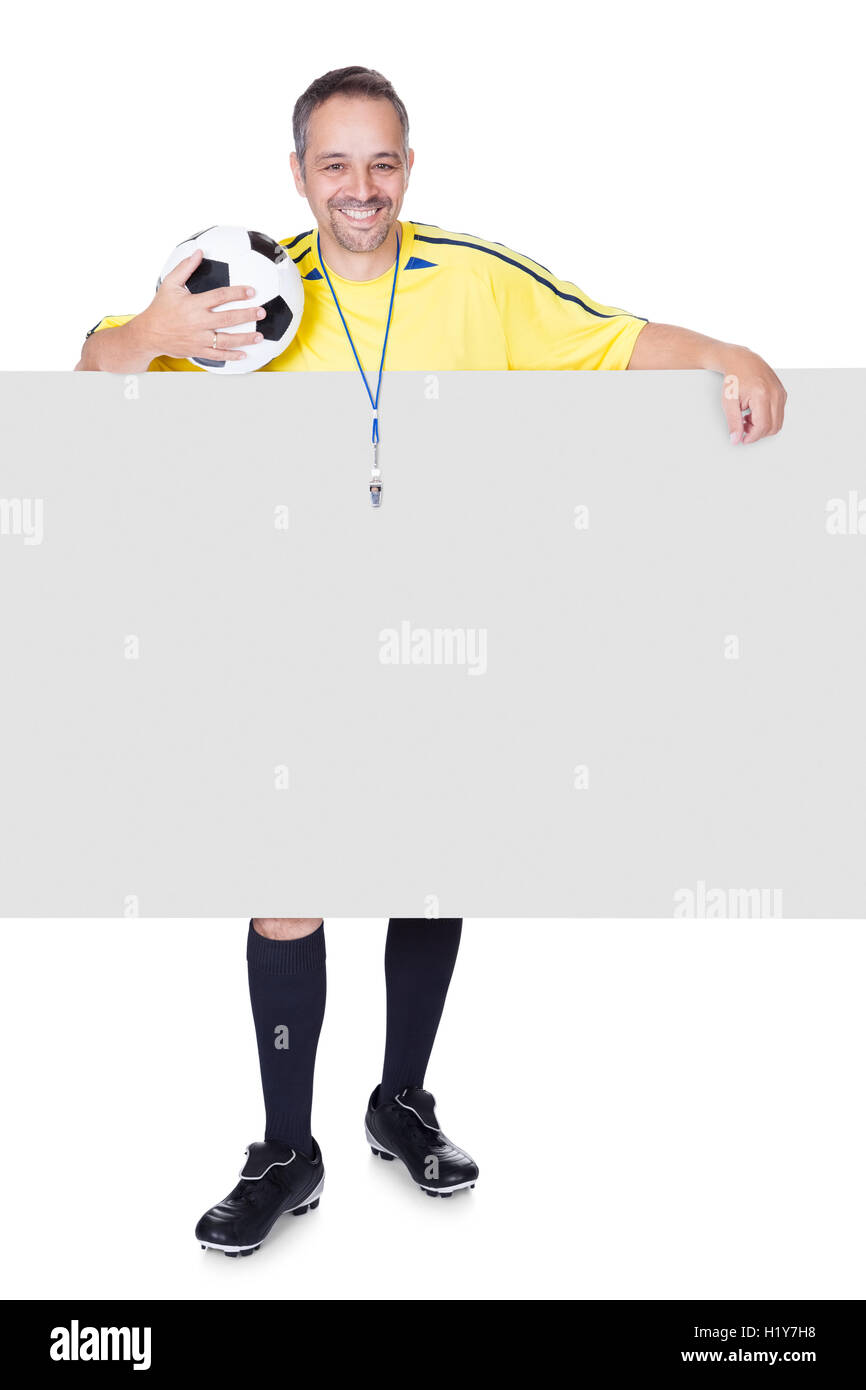 Happy Coach Holding Placard And Football Stock Photo - Alamy