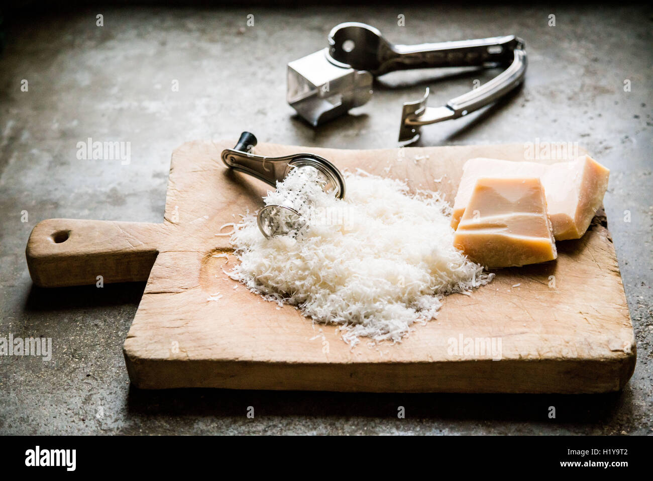 Parmesan cheese and grater Stock Photo - Alamy