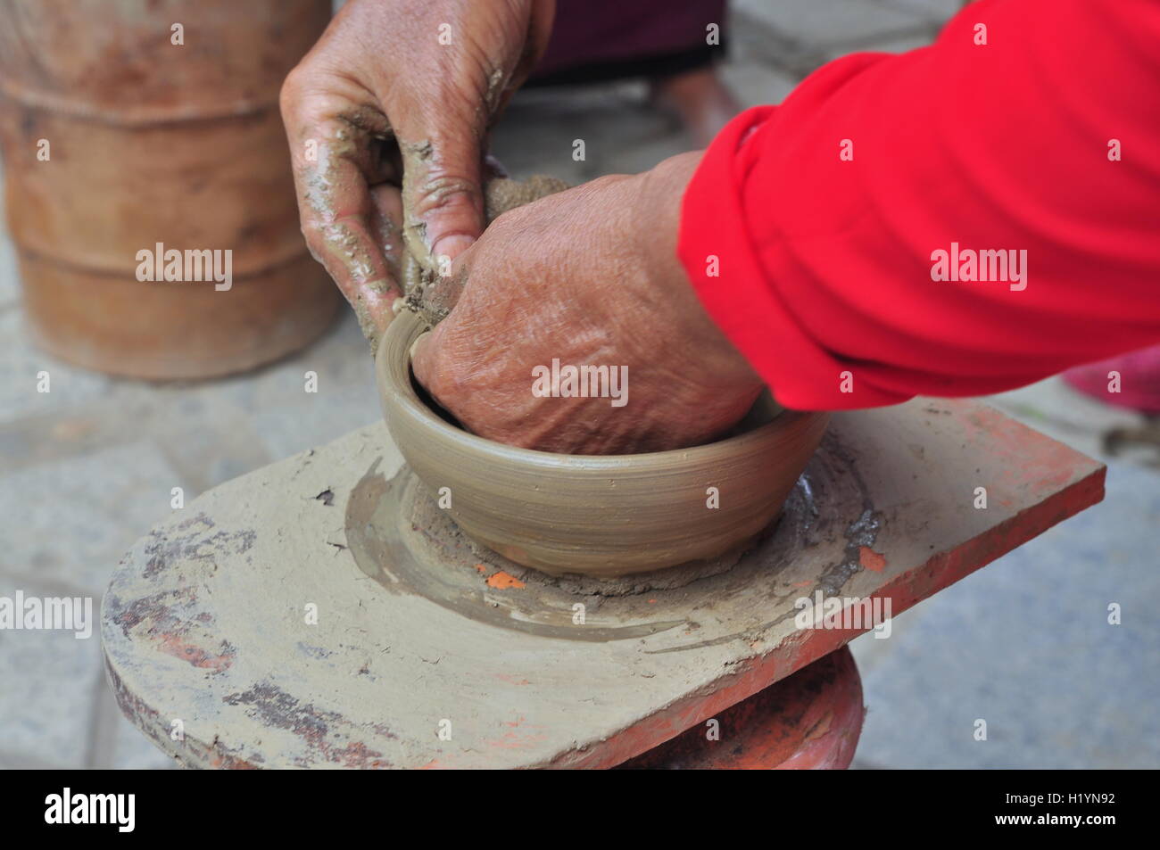 Performing the ceramic molding techniques Stock Photo - Alamy