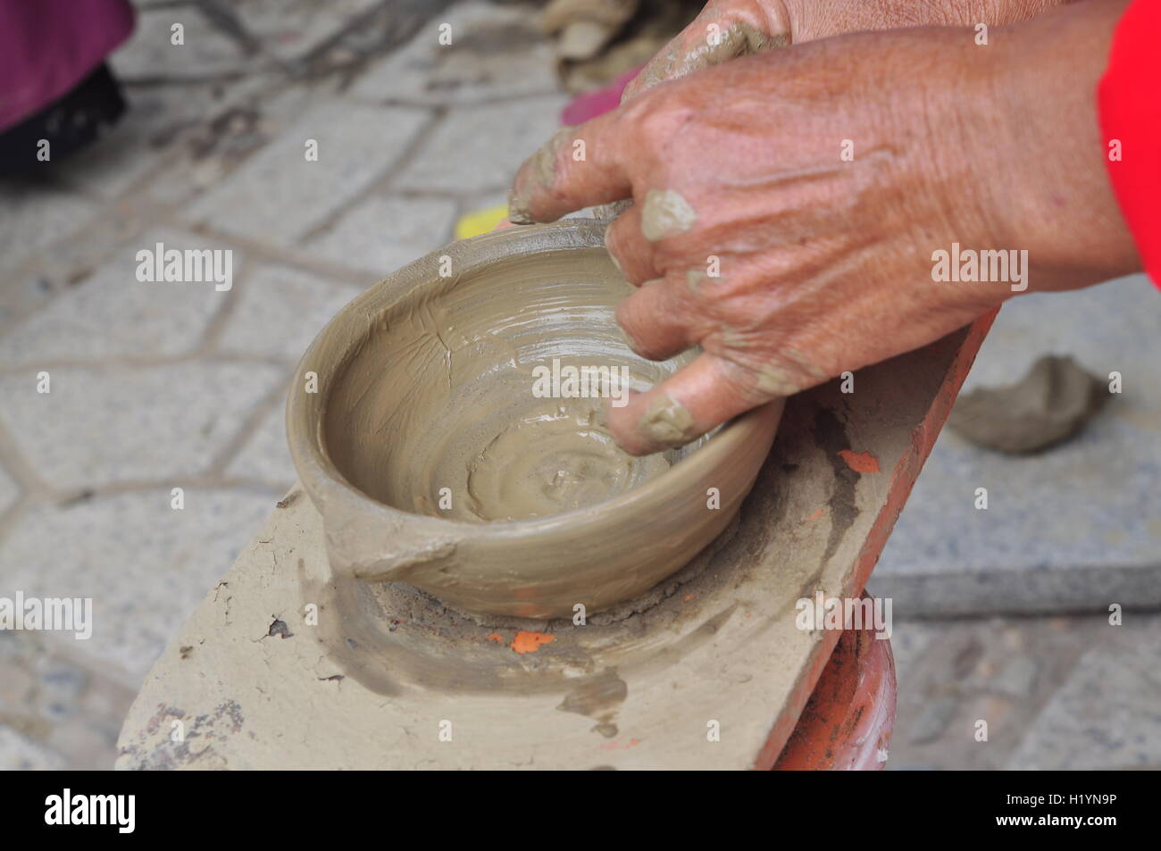 Performing the ceramic molding techniques Stock Photo - Alamy