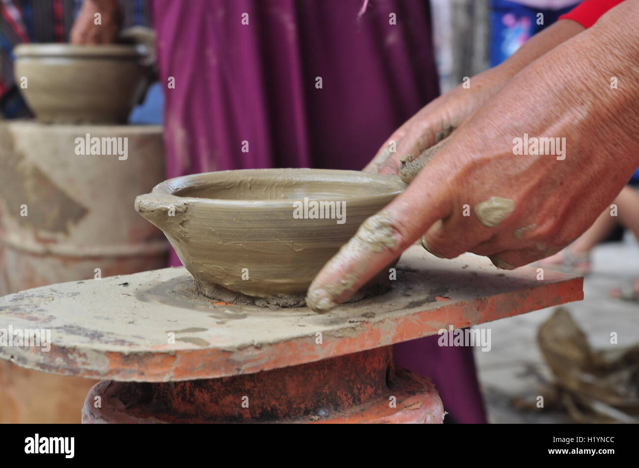 Performing the ceramic molding techniques Stock Photo - Alamy