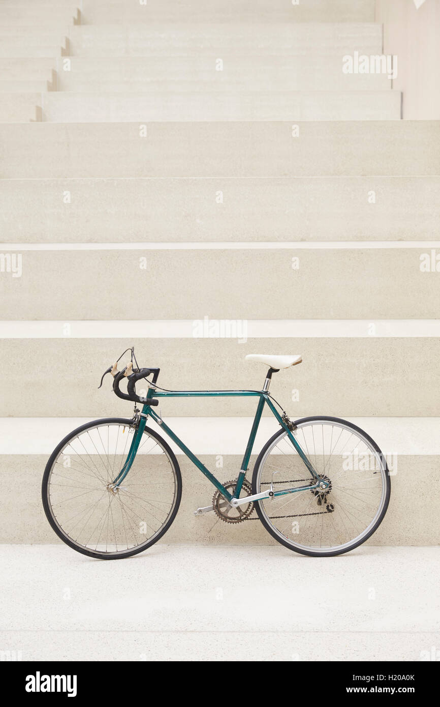 Racing cycle standing in front of stairs Stock Photo - Alamy