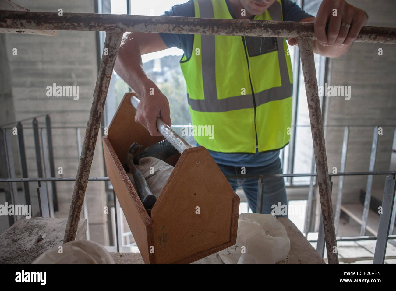 Man carrying tool box on hi-res stock photography and images - Alamy