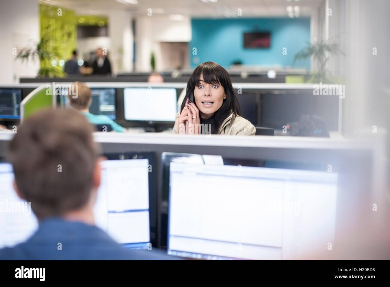 Office on phone in cubicle hi-res stock photography and images - Alamy