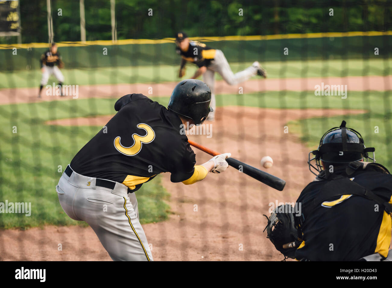 Baseball player hitting ball hi-res stock photography and images - Alamy