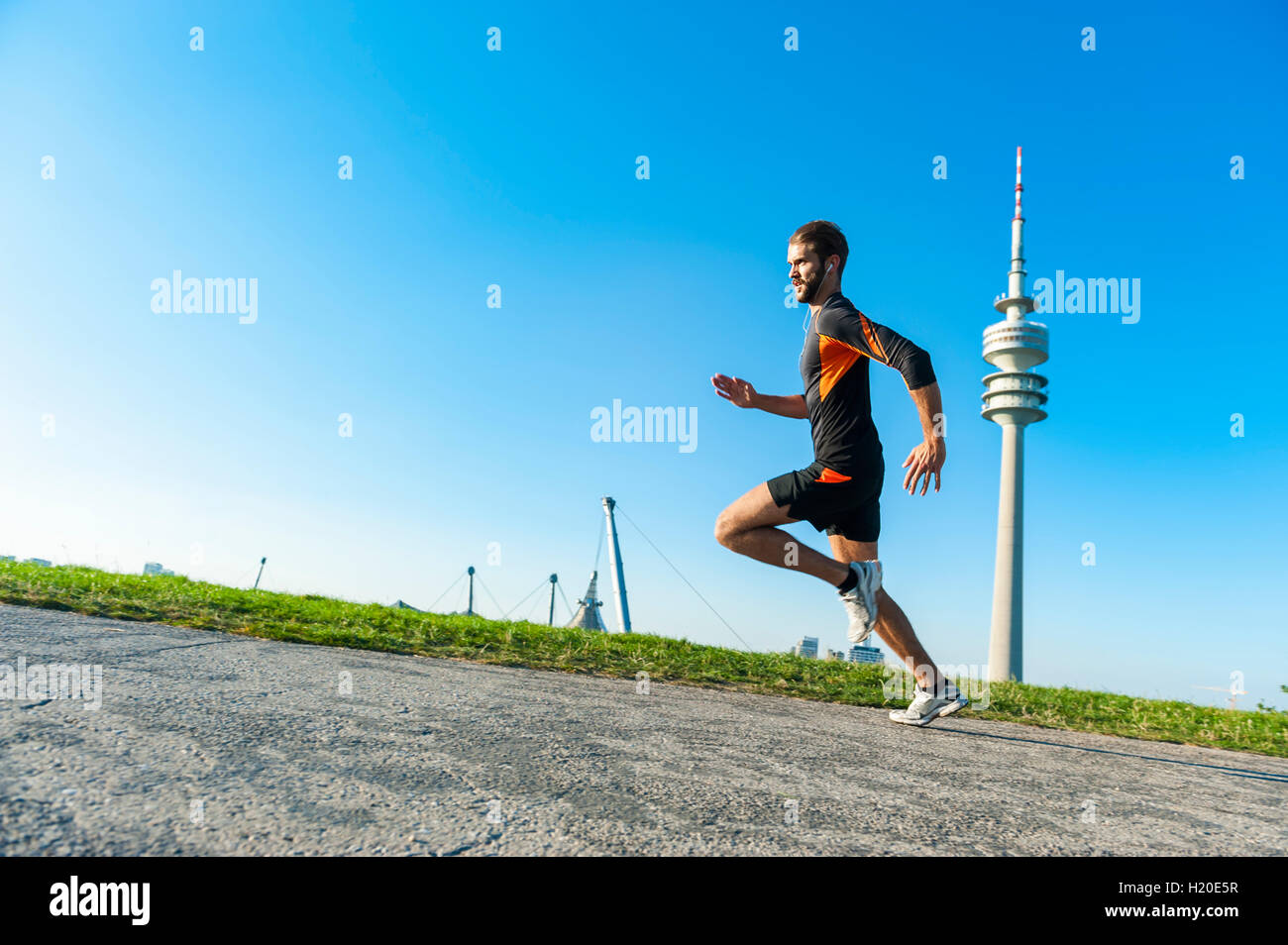 Man running fast on path Stock Photo - Alamy