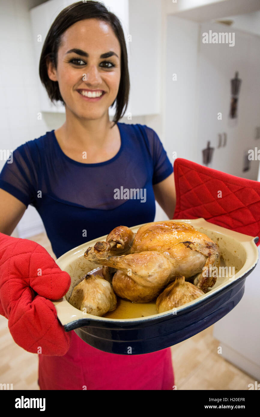 Woman roast chicken portrait hi-res stock photography and images - Alamy