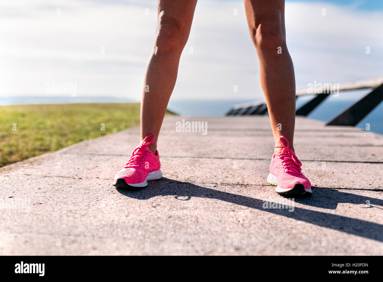 Legs of female runner Stock Photo - Alamy