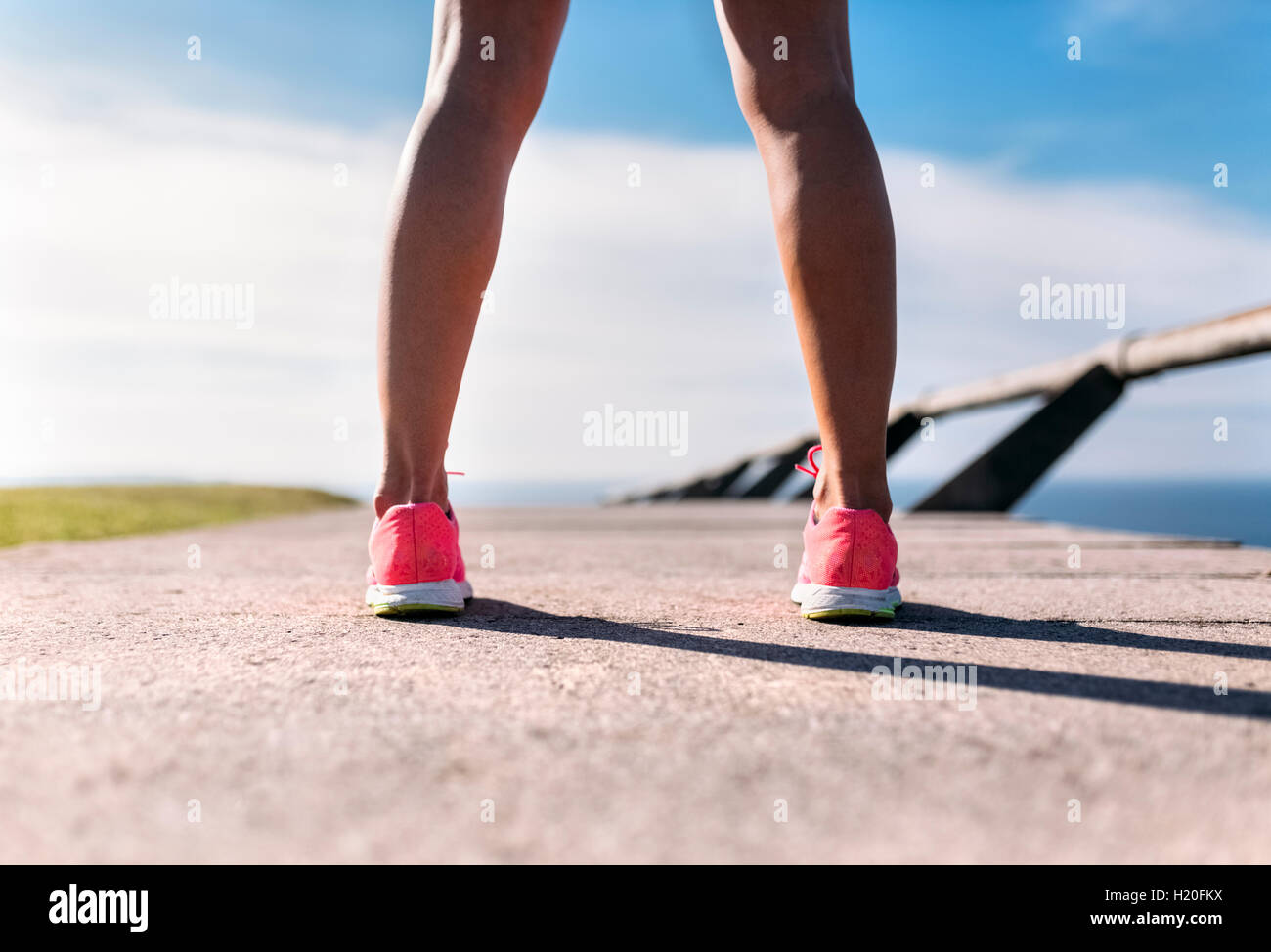 Legs of female runner, rear view Stock Photo - Alamy