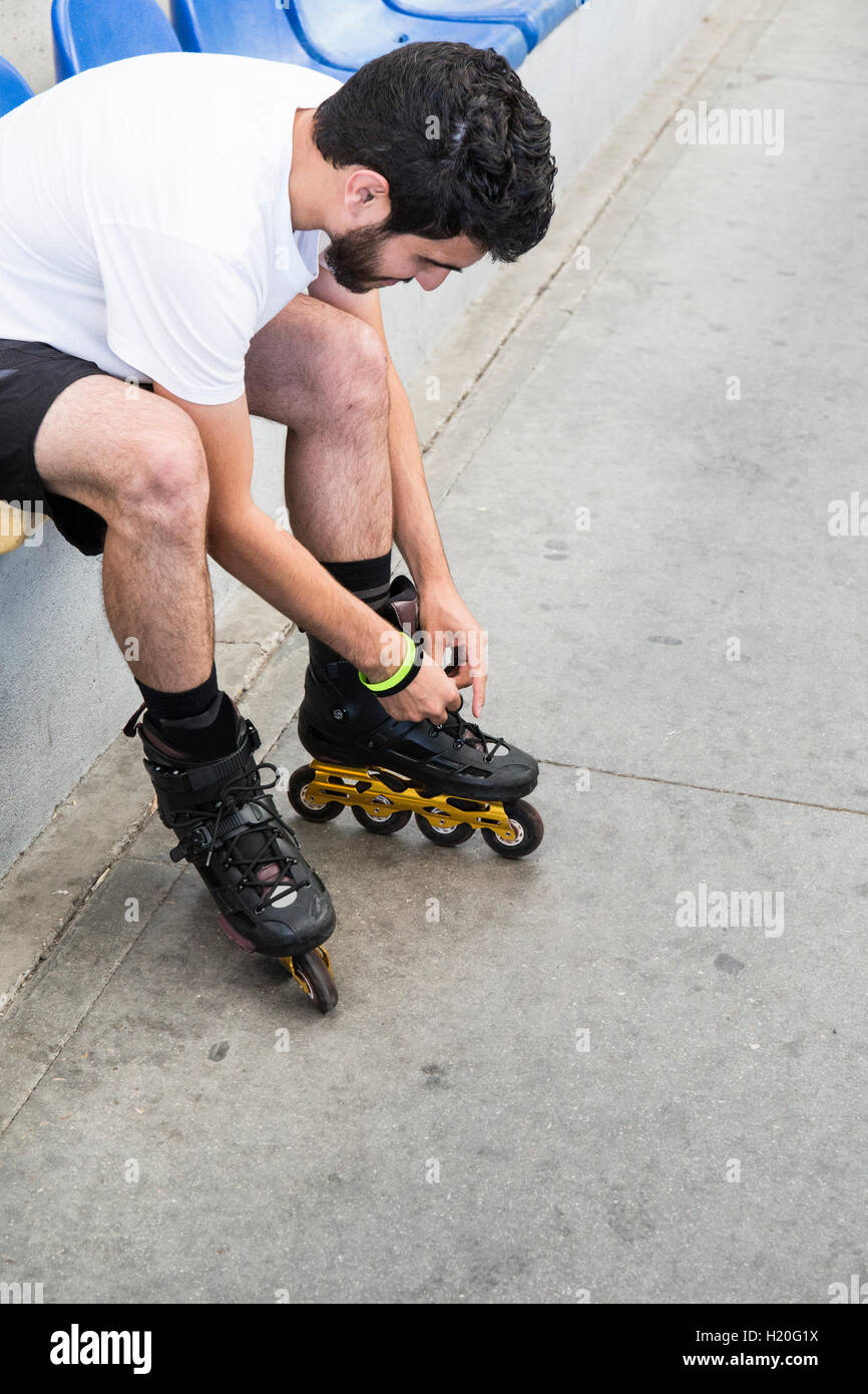 Man with rollerblades skating Stock Photo - Alamy