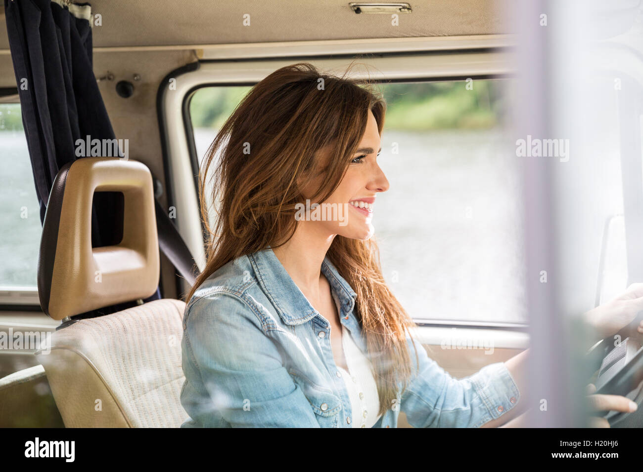 Woman by van hi-res stock photography and images - Alamy