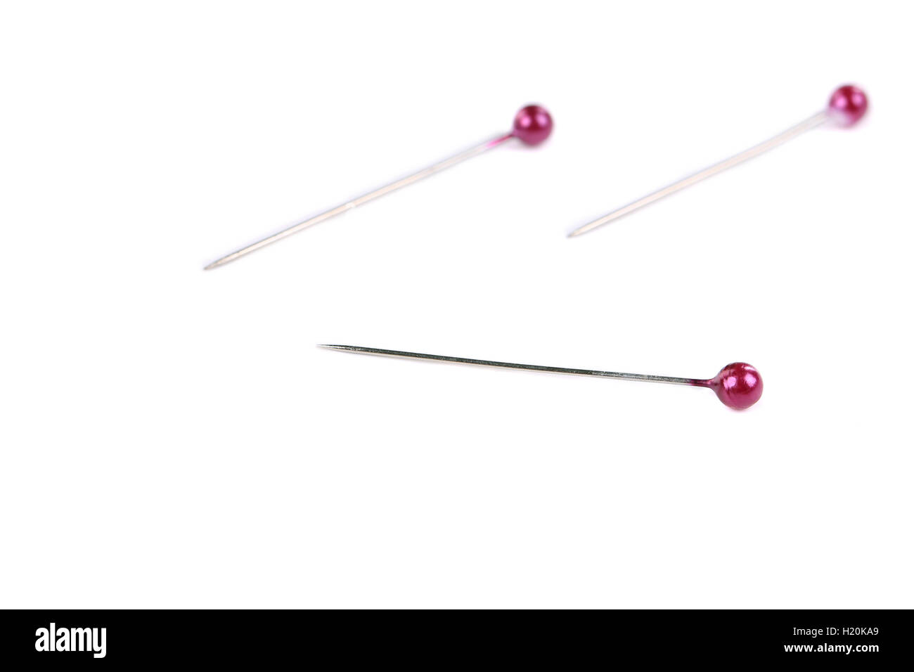 Many pins isolated on white Stock Photo - Alamy