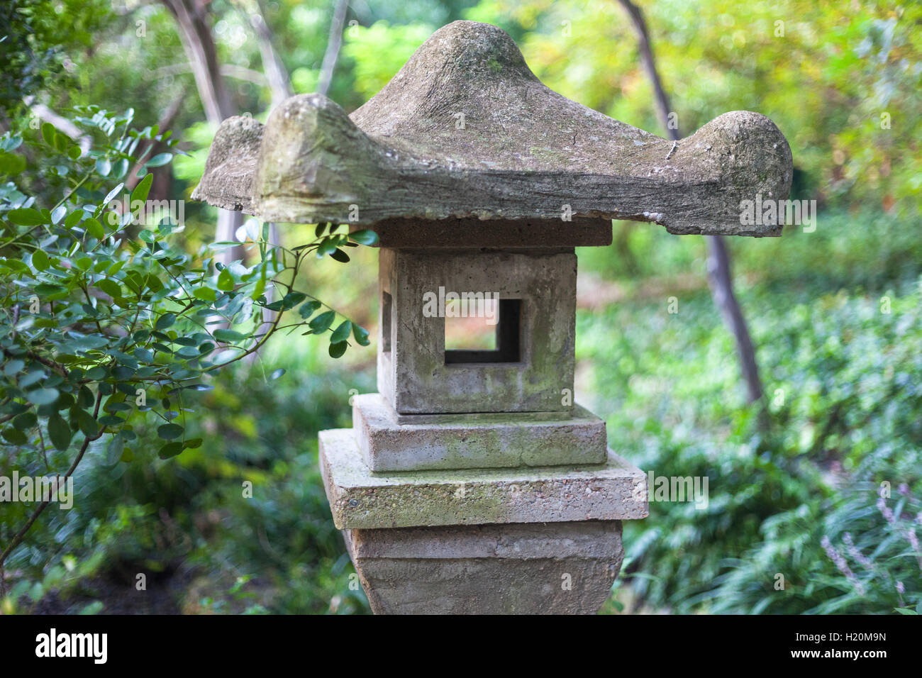 Stone Japanese architecture structure in Asian garden Stock Photo - Alamy
