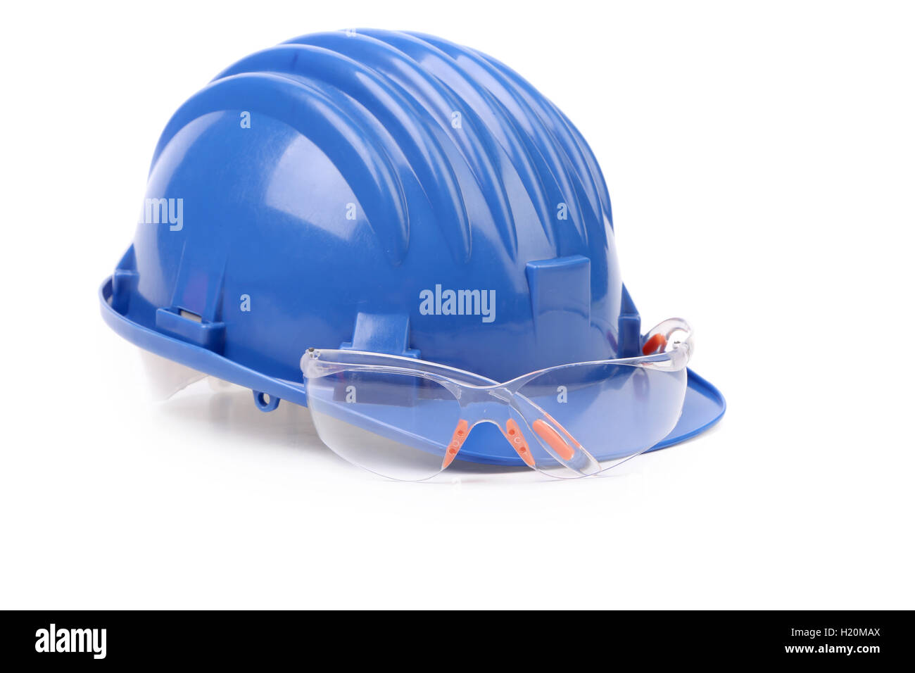 Blue hard hat and glasses Stock Photo - Alamy