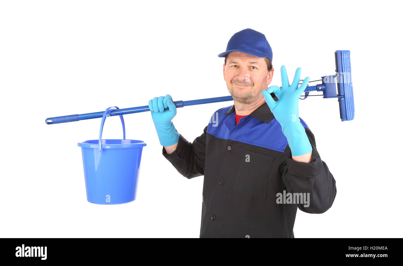 Man holding broom and bucket Stock Photo - Alamy