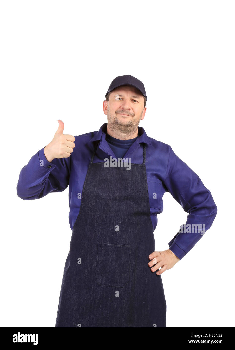 Worker wearing black apron Stock Photo - Alamy