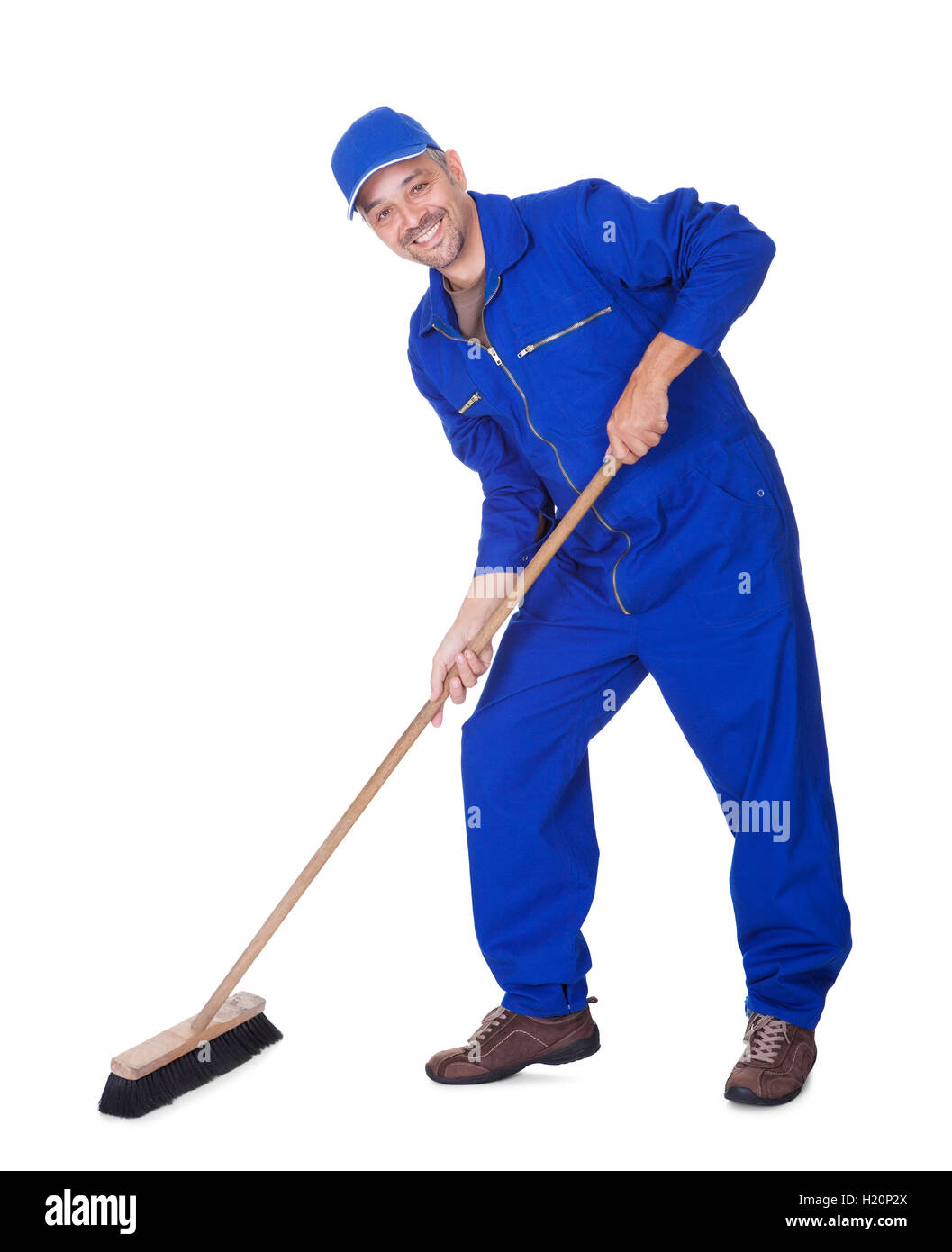 Happy Sweeper Cleaning Floor Stock Photo - Alamy