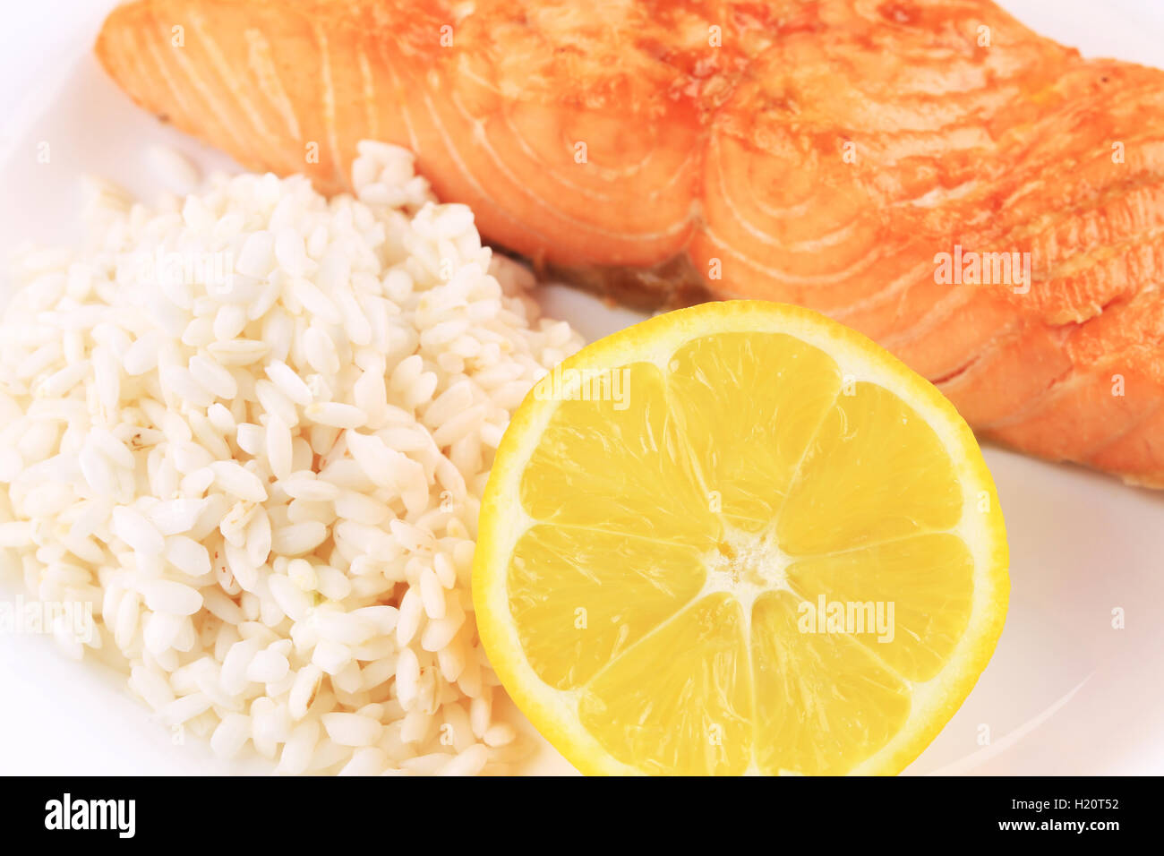 Roasted salmon fillets with rice Stock Photo - Alamy