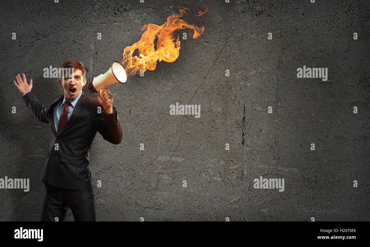 businessman shouting into a megaphone Stock Photo - Alamy
