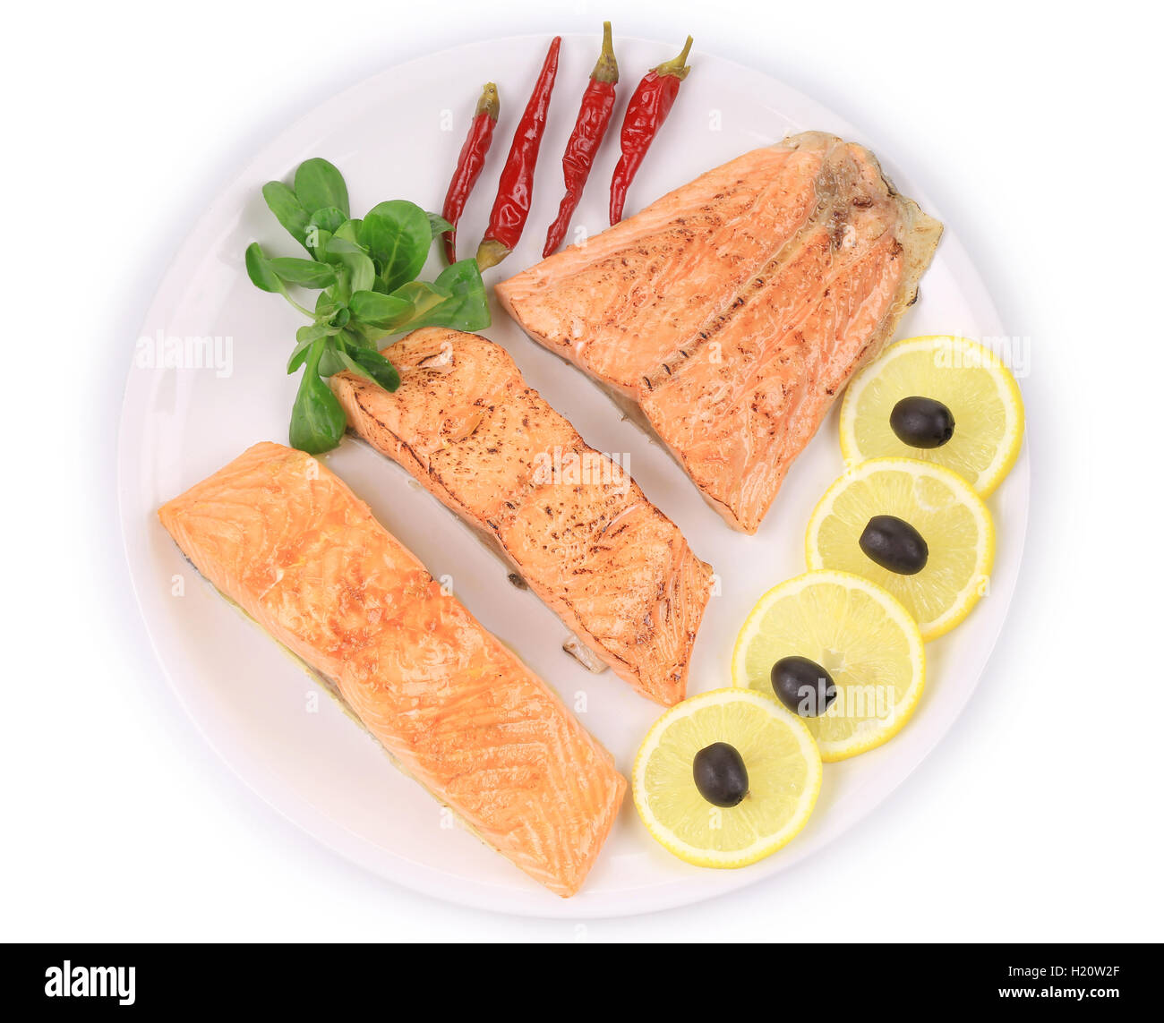 Slices of red fish fillet on plate Stock Photo - Alamy