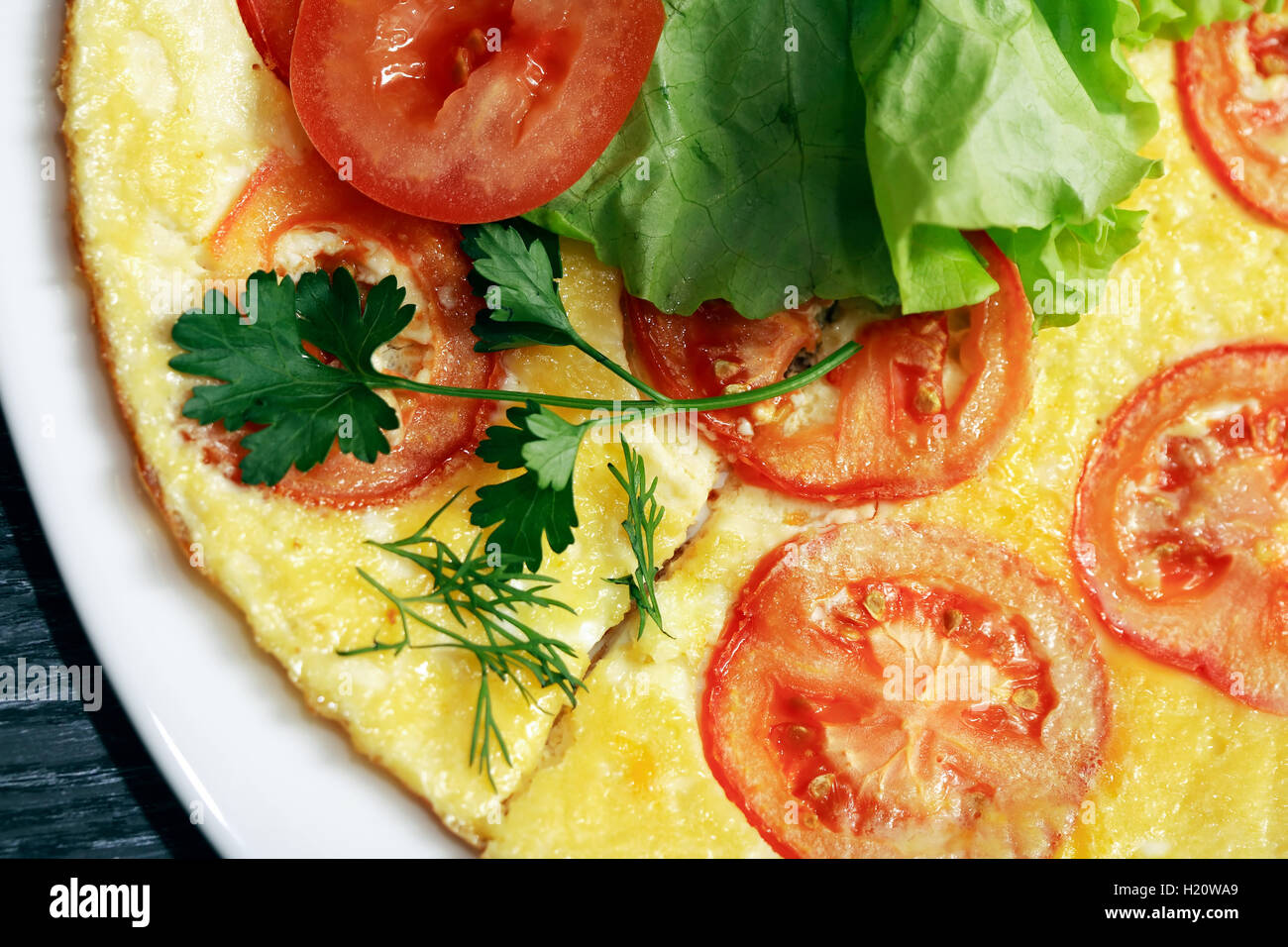 Omelet With Tomatoes Stock Photo - Alamy