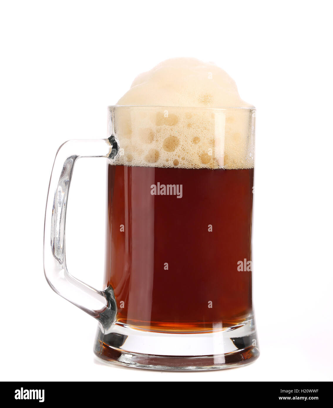 Tall big mug of brown beer with foam Stock Photo - Alamy