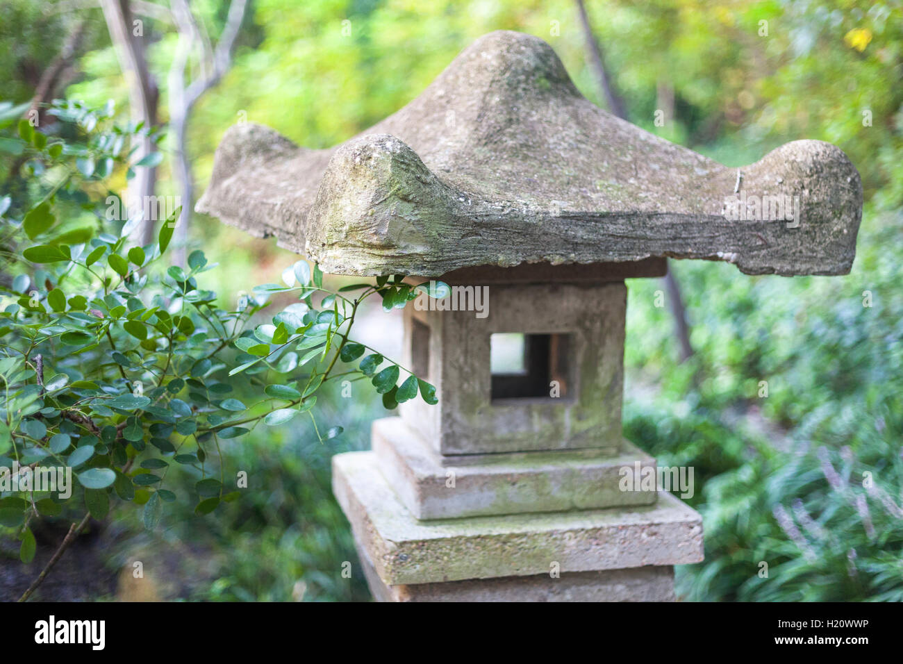 Stone Japanese architecture structure in Asian garden Stock Photo - Alamy