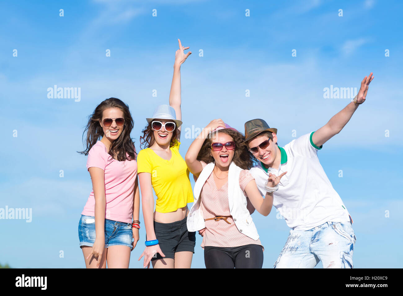 Group of young people having fun Stock Photo - Alamy