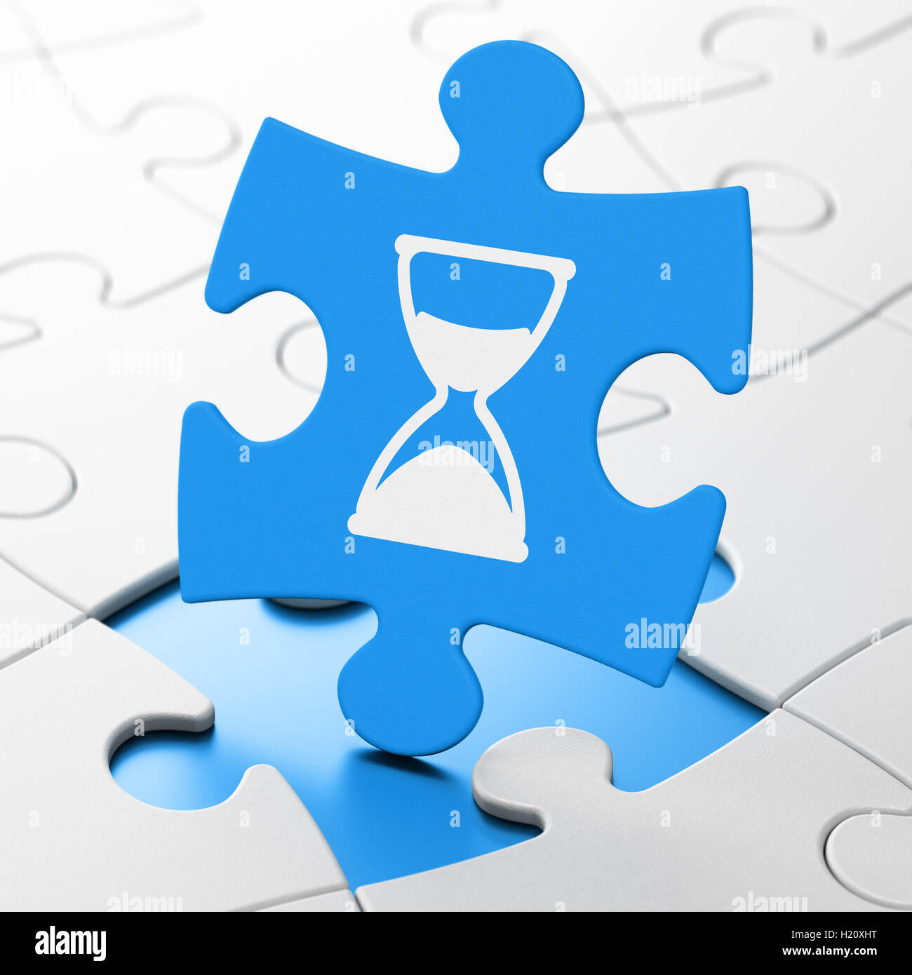 Time concept: Hourglass on puzzle background Stock Photo - Alamy