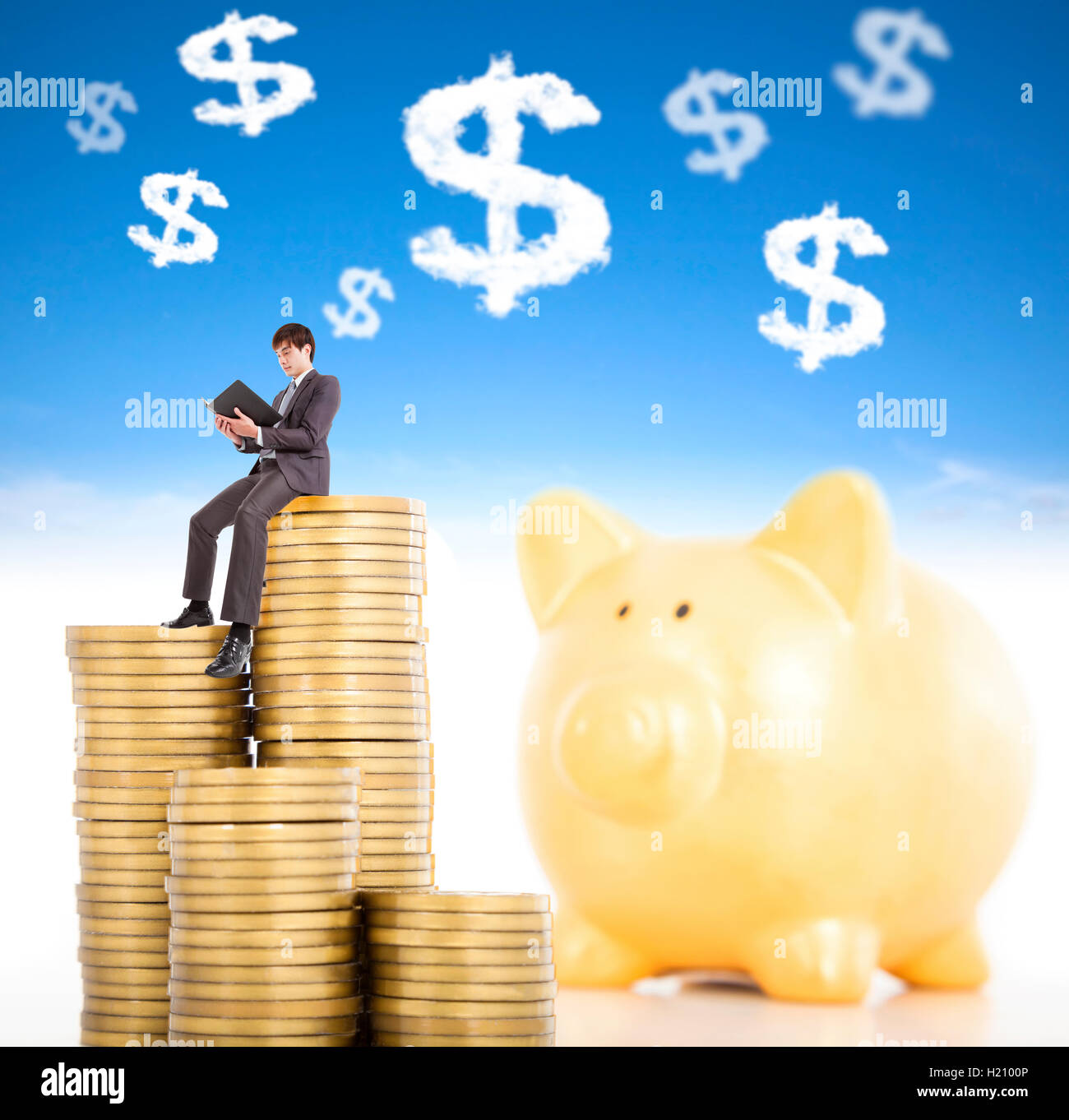young man thinking and counting coin in poggy bank Stock Photo - Alamy