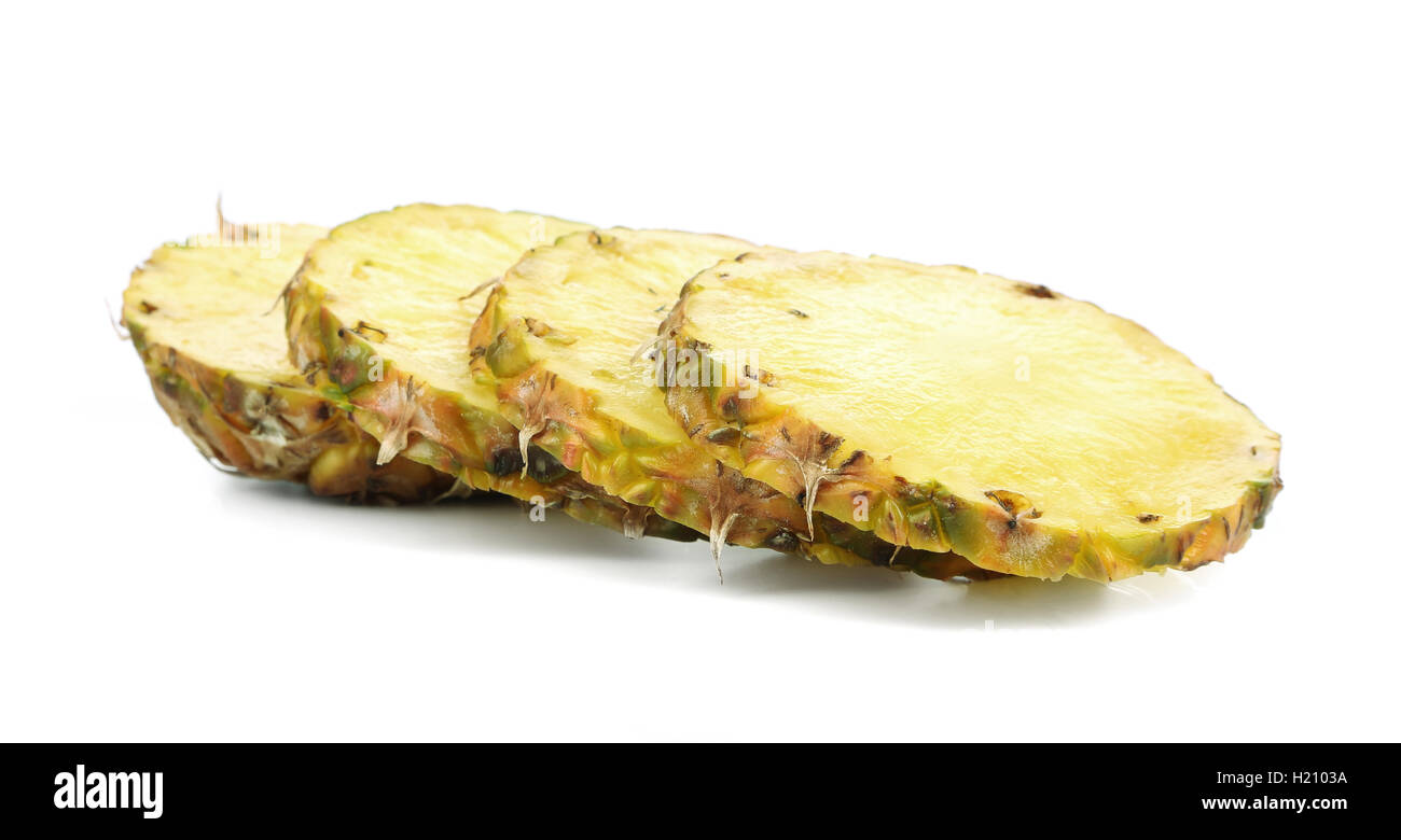Row sliced pineapple Stock Photo - Alamy
