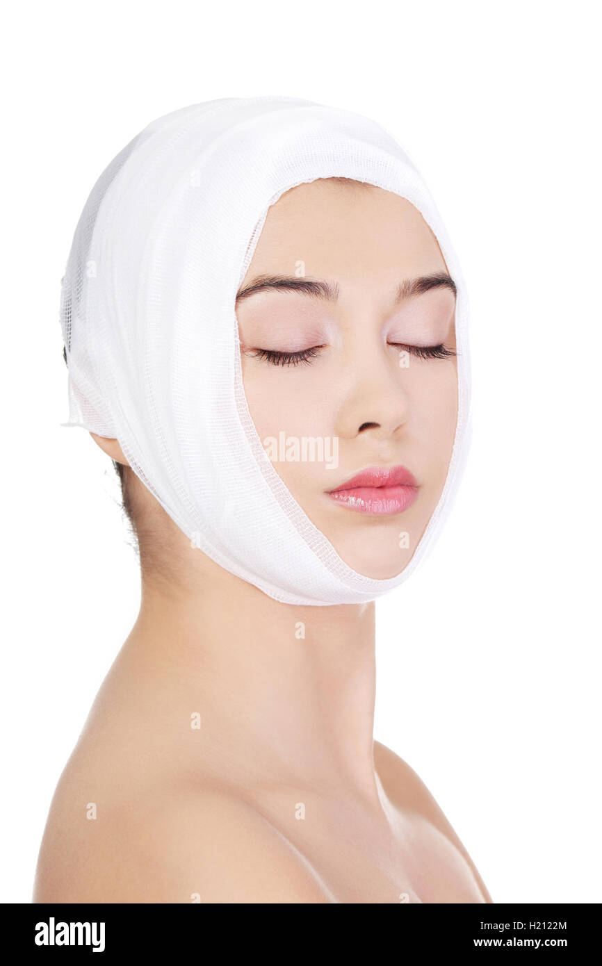 Portrait of beautiful young female face with bandage Stock Photo - Alamy