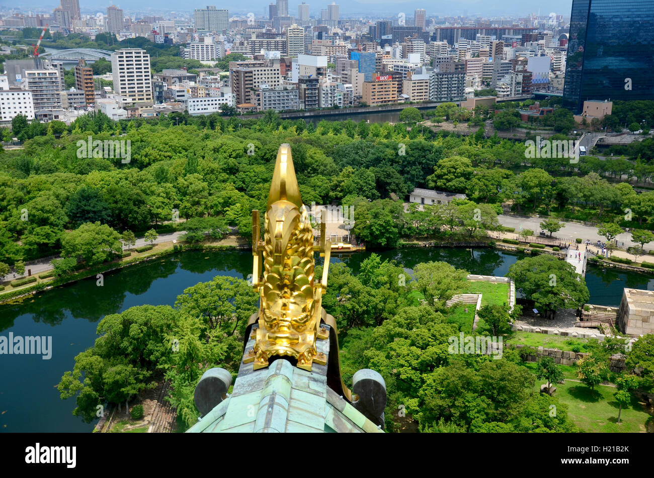 Golden dragon fish statue or Shachihoko at roof top and aerial view ...