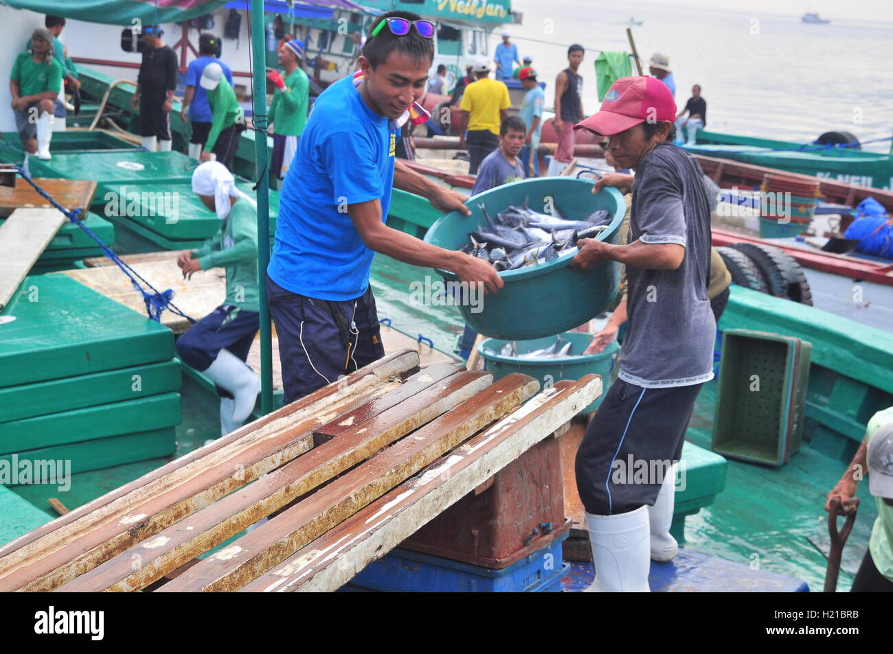General Santos, Philippines - September 5, 2015: Workers are loading ...