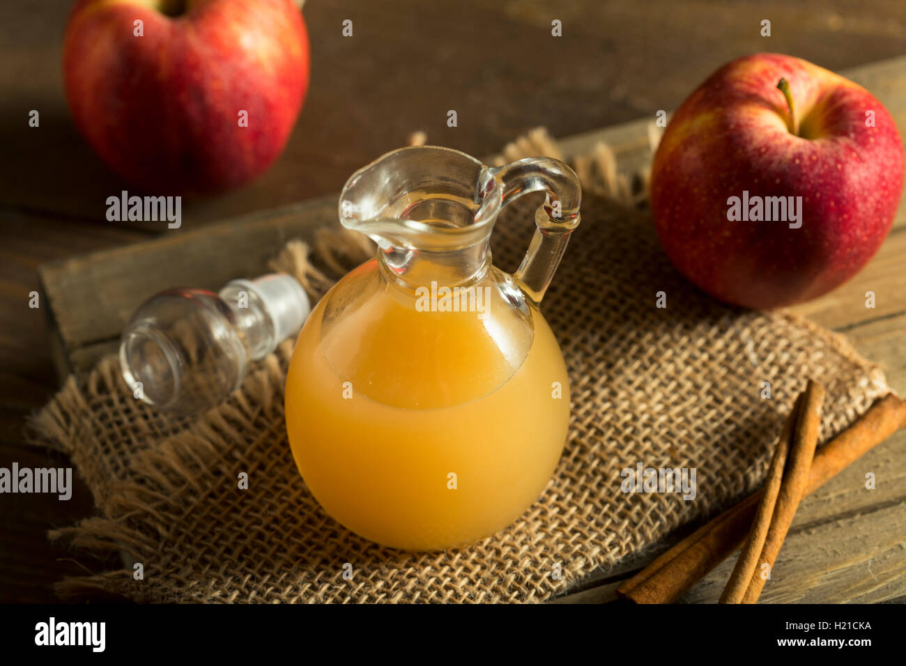 Raw Organic Apple Cider Vinegar in a Bottle Stock Photo - Alamy