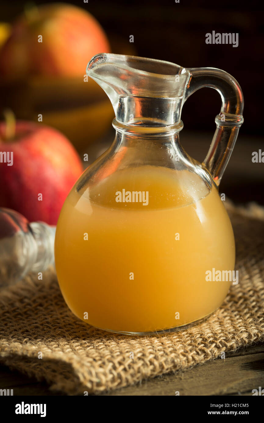 Raw Organic Apple Cider Vinegar in a Bottle Stock Photo - Alamy