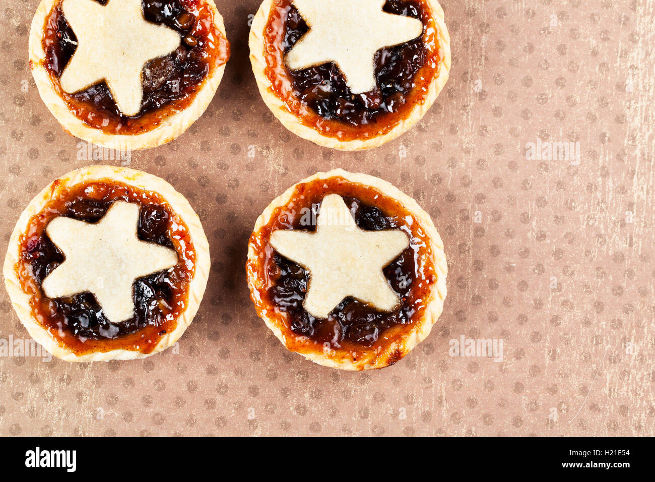Holiday mince pies with star shape, viewed from above with copy space ...