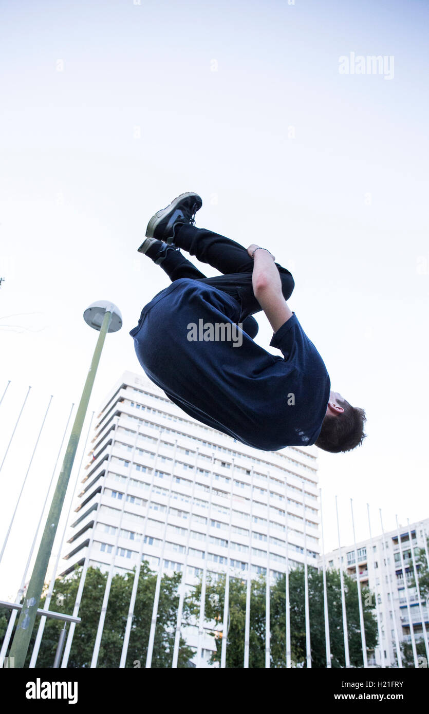 Man jumping over fence in city hi-res stock photography and images - Alamy