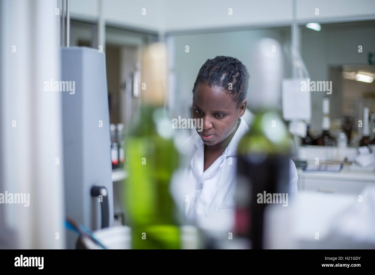 Woman working in lab Stock Photo - Alamy