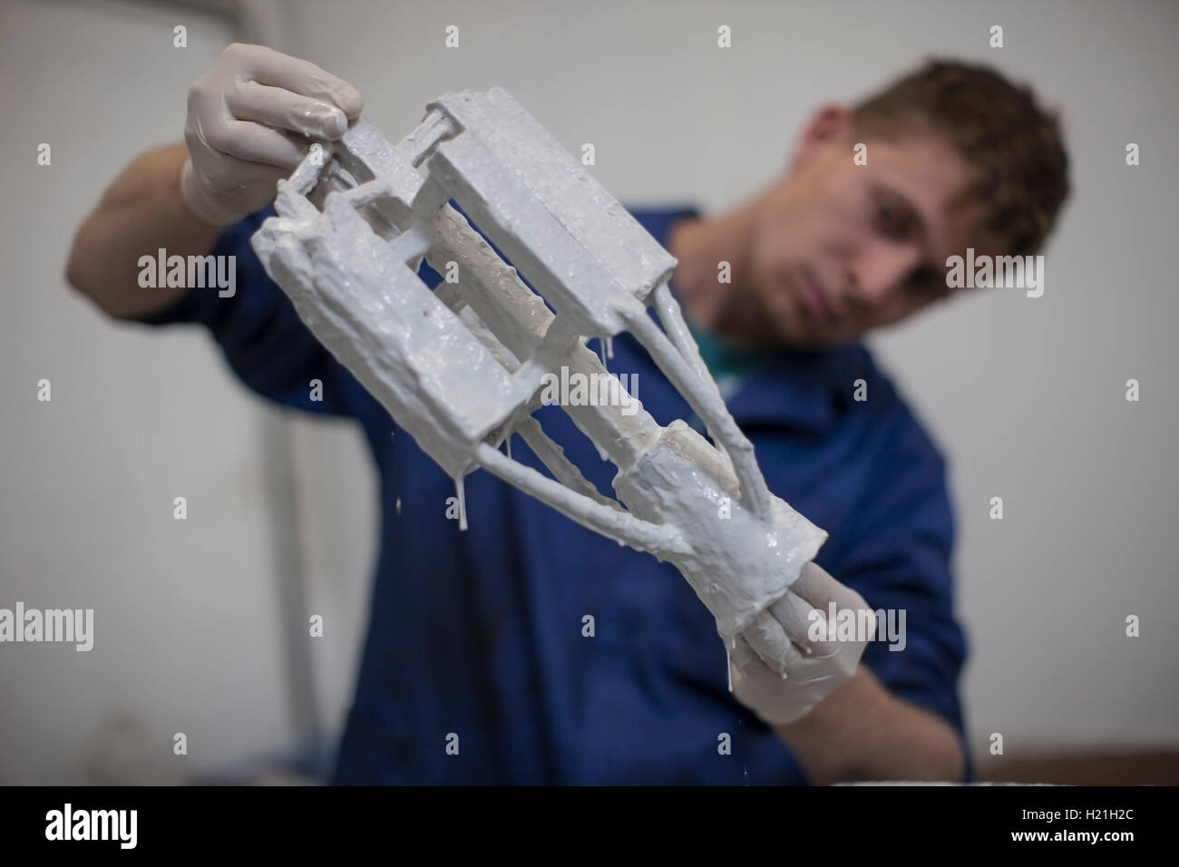 Man holding cast Stock Photo - Alamy