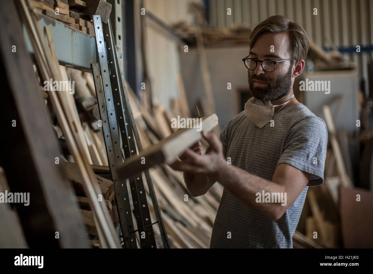 Carpenter examining piece of wood hi-res stock photography and images ...
