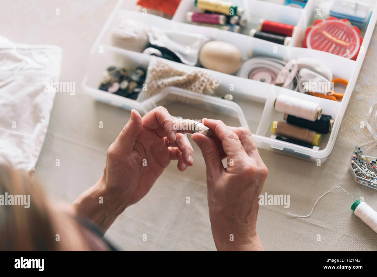 Hand thimble close up hi-res stock photography and images - Alamy