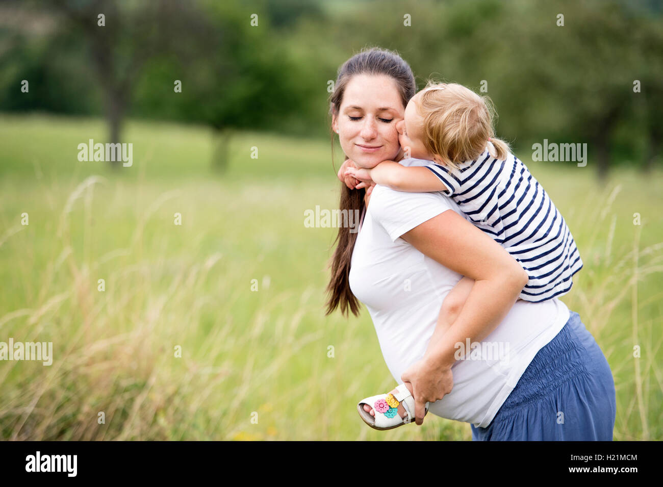 Mother carrying daughter piggyback Stock Photo - Alamy Mother carrying daughter piggyback Stock Photo - Alamy