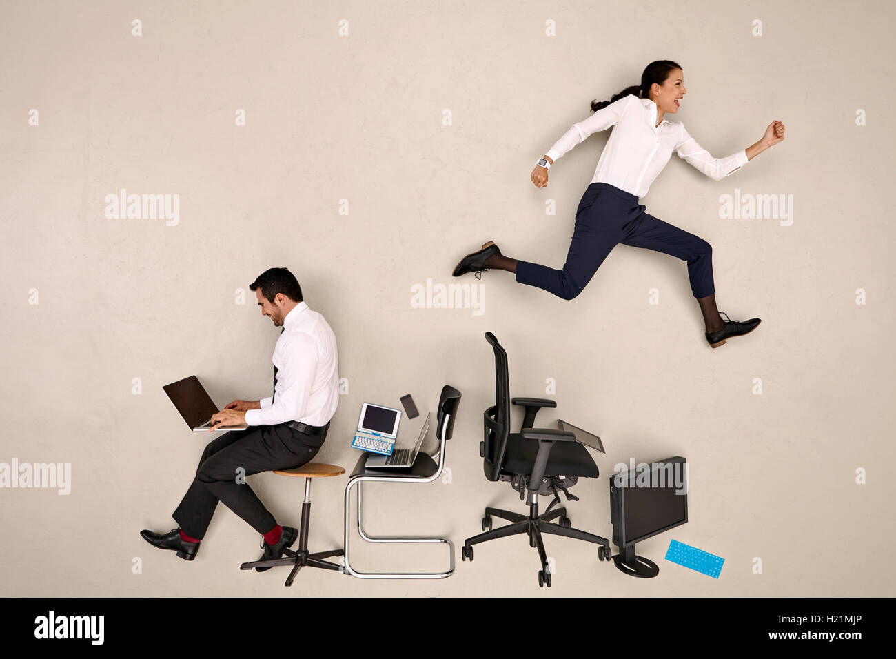Man jumping over chairs hi-res stock photography and images - Alamy