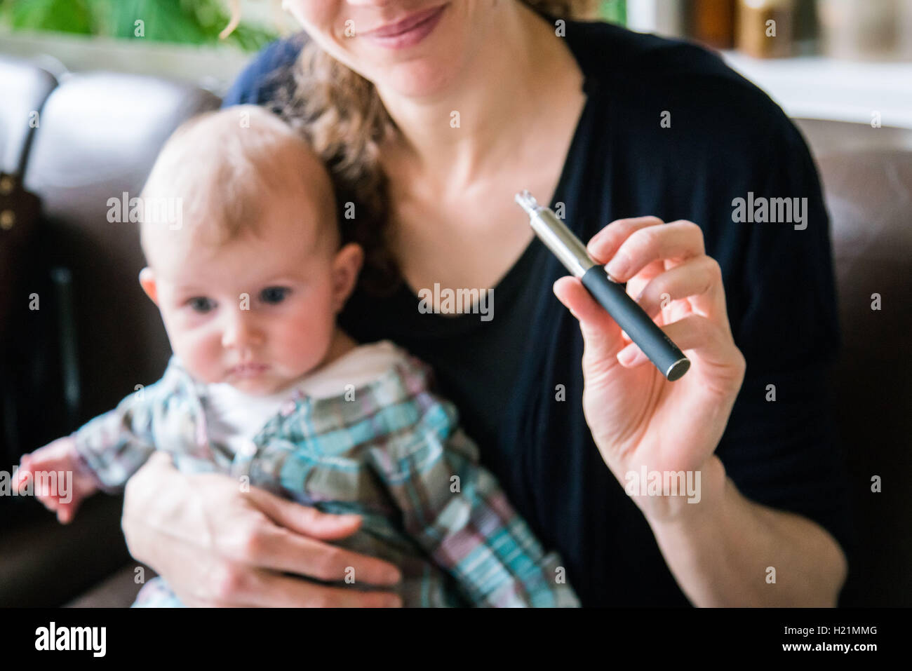 Girl smoking cigarette inside hi-res stock photography and images - Alamy