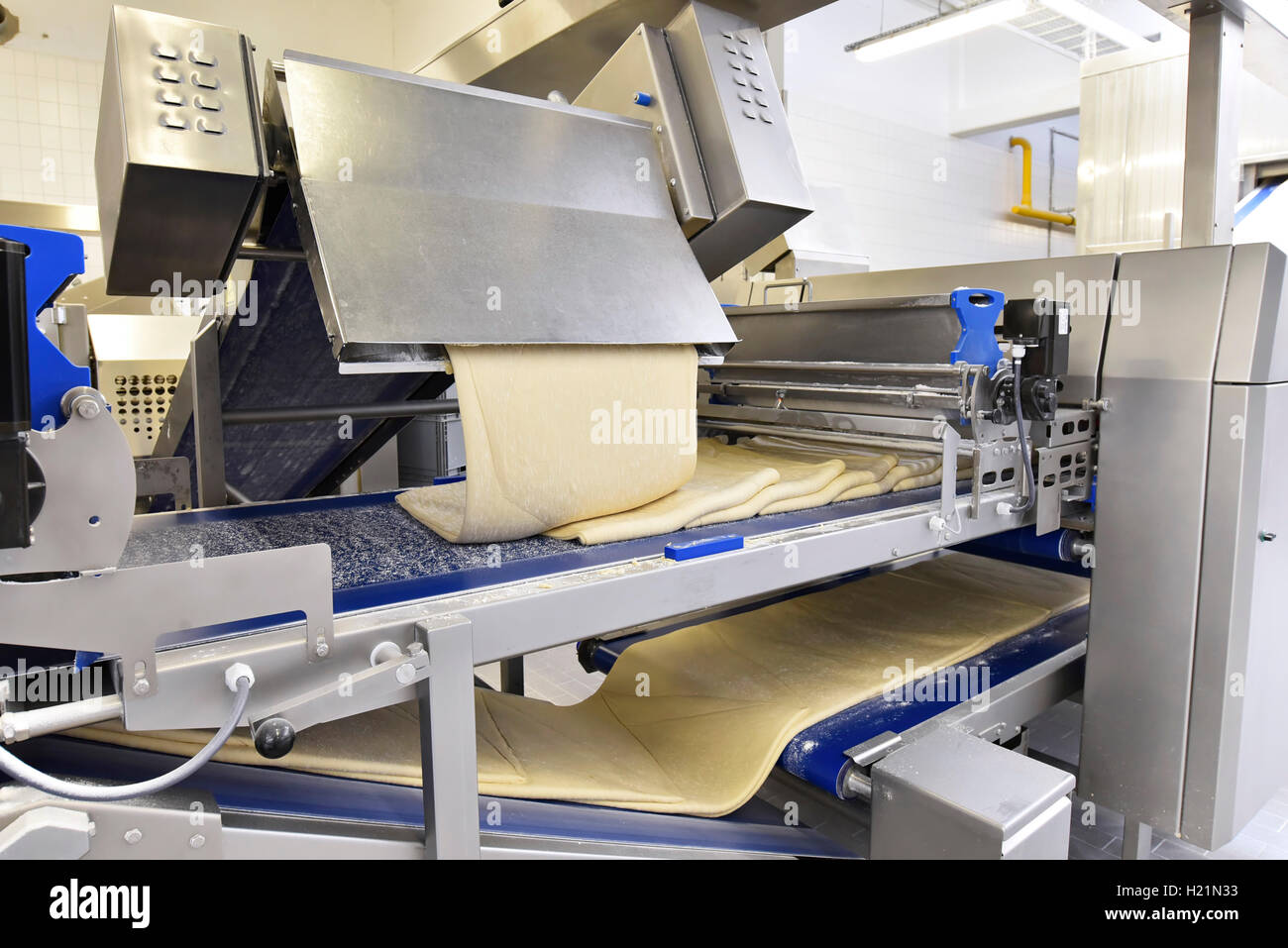 Machine with dough in an industrial bakery Stock Photo - Alamy