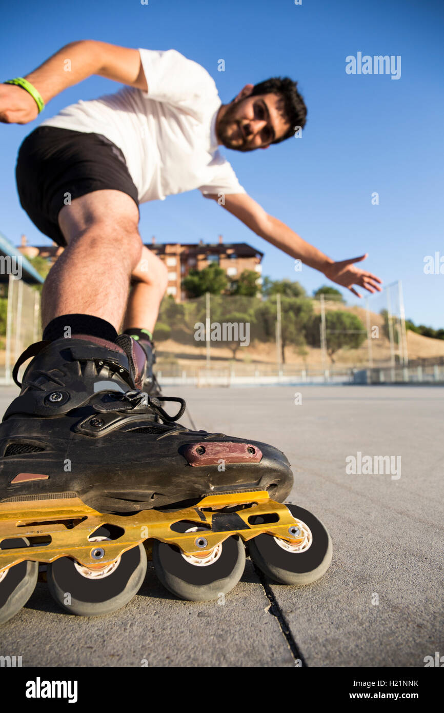 Man with rollerblades skating Stock Photo - Alamy